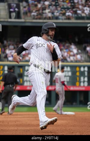 Colorado Rockies center fielder Jake McCarthy (31) warms up before a ...