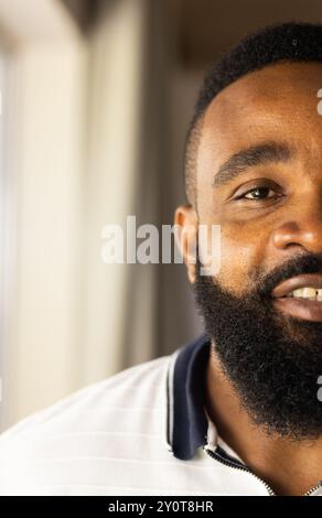Young man with beard wearing engagement ring smiling happy pointing ...