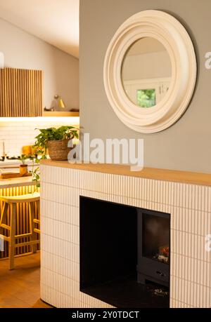 Interior of room with fireplace and mirror Stock Photo - Alamy
