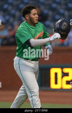 Omar Alfonzo (50) of the Greensboro Grasshoppers at bat in a South ...