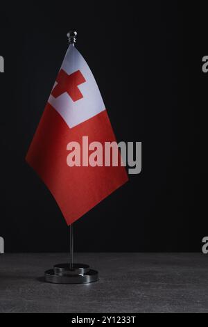 Small national flag of the Tonga on a black background Stock Photo - Alamy
