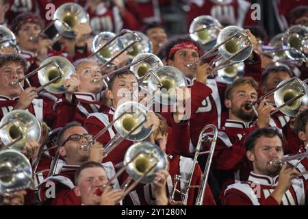Members of the Wisconsin marching band perform before an NCAA college ...