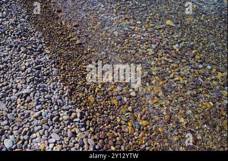 Colourful pebbles with a variety of patterns Stock Photo - Alamy