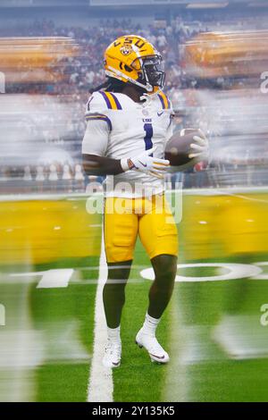LSU wide receiver Aaron Anderson (1) carries the ball during an NCAA ...