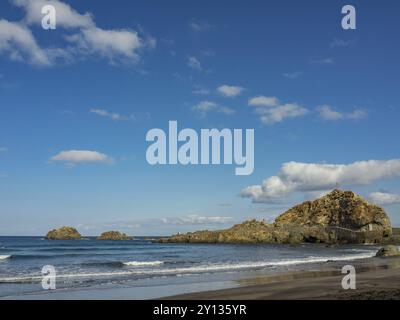 Rocks with a nice sky looking out to the sea Stock Photo - Alamy