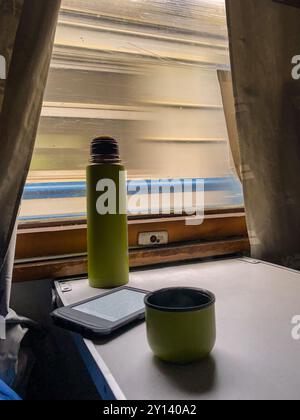 Cozy Train Compartment with Scenic View Stock Photo - Alamy