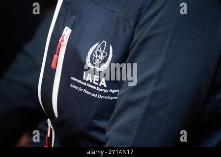 IAEA LOGO on employees clothing Stock Photo - Alamy