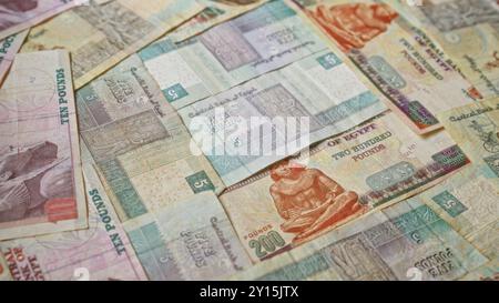Egyptian banknotes including five, ten, and two hundred pounds spread ...