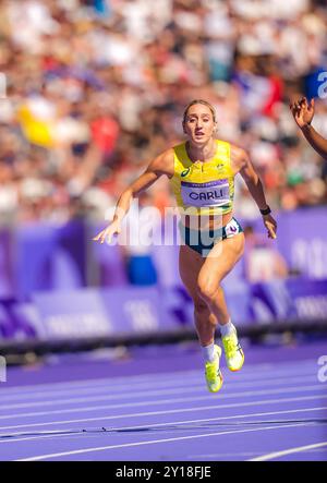 Sarah Carli participating in the 400 meters hurdles at the Paris 2024 ...