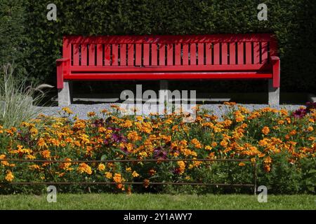 Red wooden bench in Lucerne Stock Photo - Alamy
