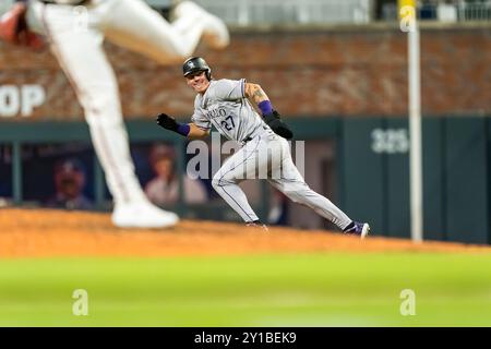Colorado Rockies outfielder Jordan Beck warms up prior to a spring ...