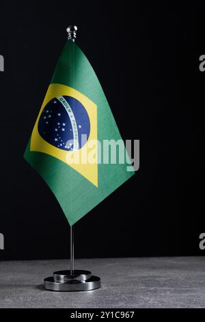 Brasil national flag against black background with spark Stock Photo ...