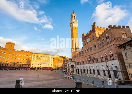 Siena historic public palace and clock tower at sunset, in Italy Stock ...