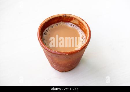 A cup of Milk tea or Dudh Cha in a traditional natural clay cup. Top ...