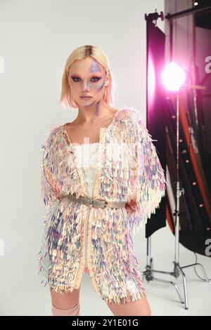 A fashion-forward blonde woman showcases her unique outfit and style ...