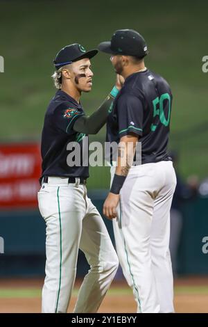 Omar Alfonzo (50) of the Greensboro Grasshoppers at bat in a South ...