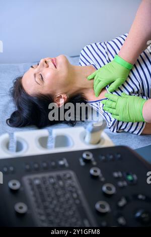doctor checking lymph nodes of woman at hospital Stock Photo - Alamy