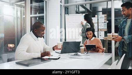 business team with coffee working at night office Stock Photo - Alamy