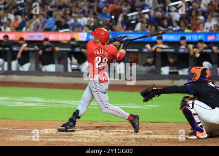 Cincinnati Reds' TJ Friedl hits a double during the third inning of a ...