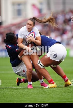France's Yllana Brosseau is tackled by England's Maud Muir during the ...
