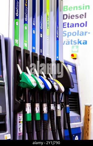 Different kinds of fuel pumps at a gas station Stock Photo - Alamy