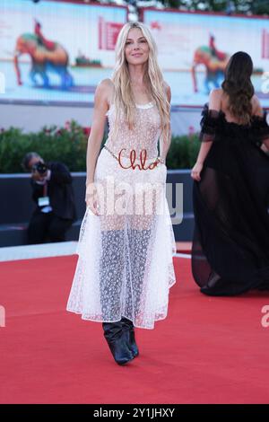 Sienna Miller poses for photographers upon arrival at the 'The Fashion ...