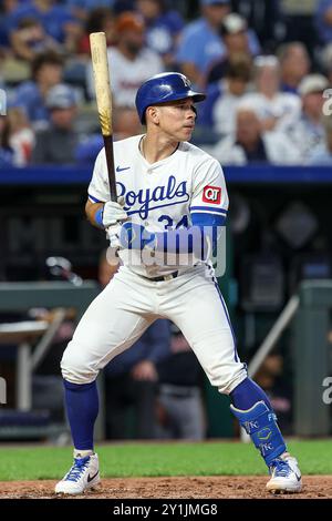 Kansas City Royals' Freddy Fermin (34) is congratulated after hitting a ...