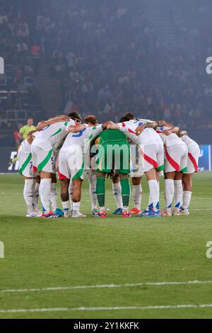 Italy players hug each other in a circle during UEFA Women's EURO 2025 ...
