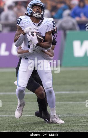 Toronto Argonauts' Damonte Coxie (86) celebrates with Anthony Vandal ...