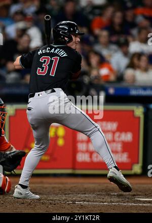 Arizona Diamondbacks' Jake McCarthy (31) scores on a single by Geraldo ...