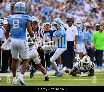 North Carolina tight end Bryson Nesbit runs a drill at the school's NFL ...