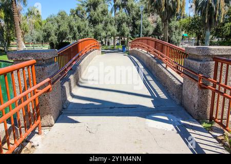 metal concrete stone bridge with rails over the river Stock Photo - Alamy