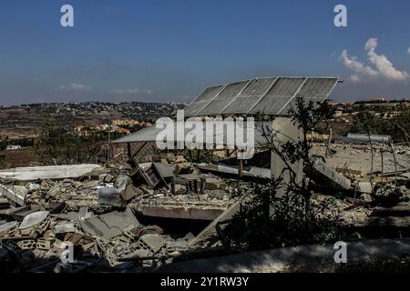 The southern town of Khiam, Lebanon, is seen through a fence near the ...
