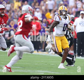 LSU wide receiver Zavion Thomas (0) carries on a 48 yard pass reception ...