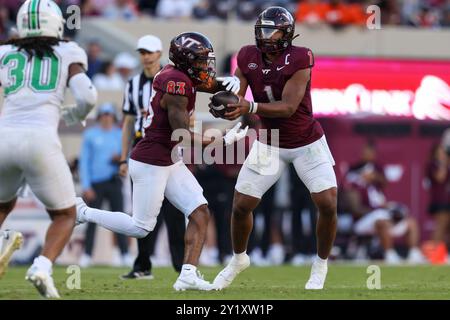 Virginia Tech wide receiver Jaylin Lane participates in a drill at the ...