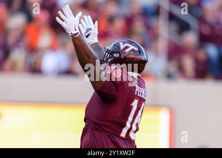 Virginia Tech defensive lineman Aeneas Peebles runs a drill at the NFL ...