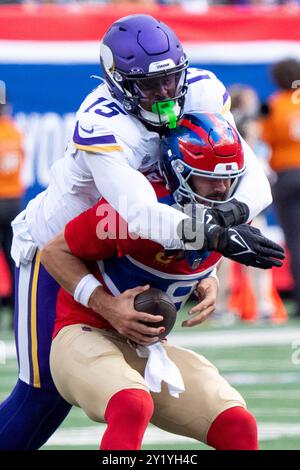 Minnesota Vikings linebacker Dallas Turner (15)walks off the field from ...