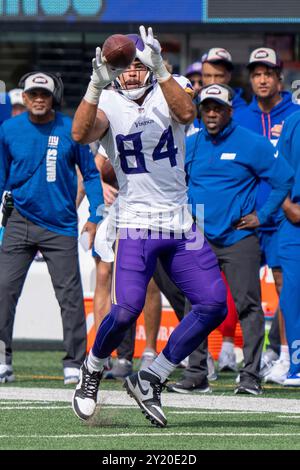 Minnesota Vikings tight end Josh Oliver (84) smiles after scoring a ...