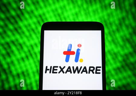In this photo illustration, a Hexaware Technologies logo is seen on a ...
