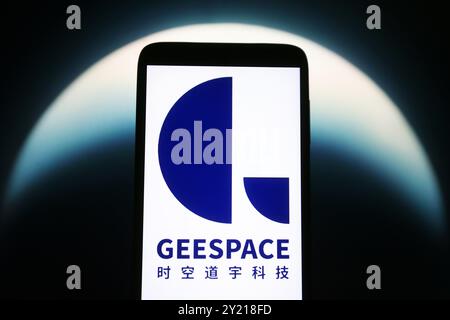 In this photo illustration, a Geespace logo is seen on a smartphone and ...