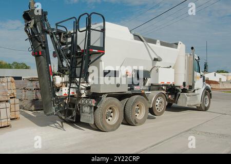 Large concrete right-angled blocks awaiting offloading from a lorry in ...