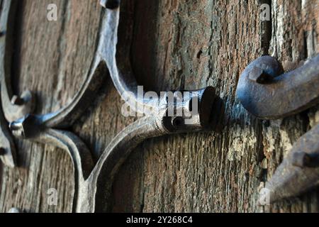Orcival. Intricate Roman wrought iron hinge displayed at the Basilica ...