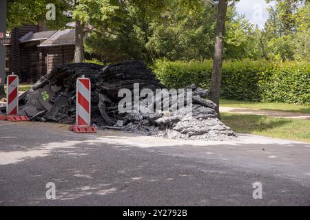 Roadwork: road construction waste with warning sign in Potsdam ...