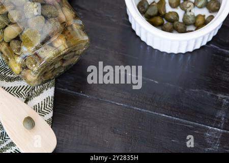 Tasty marinated capers in the bowl Stock Photo - Alamy