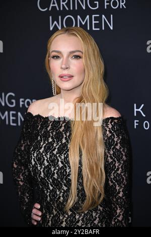 Lindsay Lohan attending the Kering Foundation's Caring for Women dinner ...
