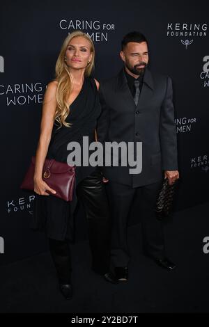 Esther Canadas, left, and Ricky Martin attend the Kering Foundation's ...