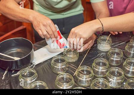 Process of making homemade candles with different aromas Stock Photo ...