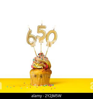Birthday candle number 650 - Cupcake and balloon decoration Stock Photo ...