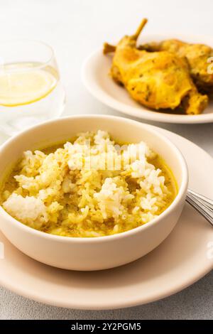 Delicious fried rabbit served with baked potatoes and bell pepper on ...