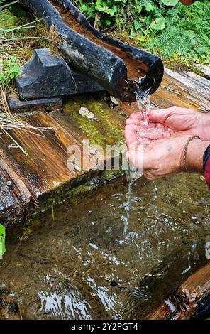 Drinking water and refresh on a trekking tour Drinking water on a ...